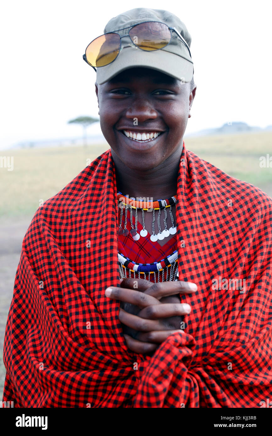 Masai man wearing colorful traditional clothes. Portrait. Masai Mara ...