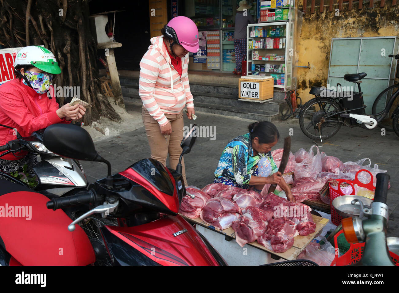 Woman selling fresh pork meat at street market. Hoi An. Vietnam Stock ...