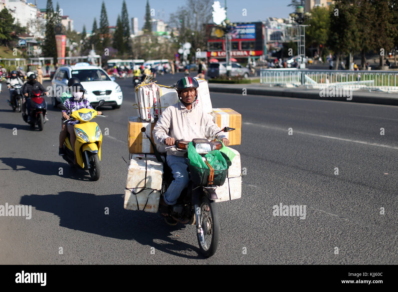 People on the streets of Dalat on scooters. Dalat. Vietnam Stock Photo ...