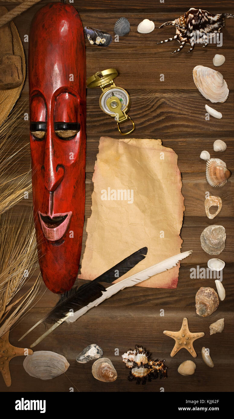maska and compass on the old paper background Stock Photo - Alamy