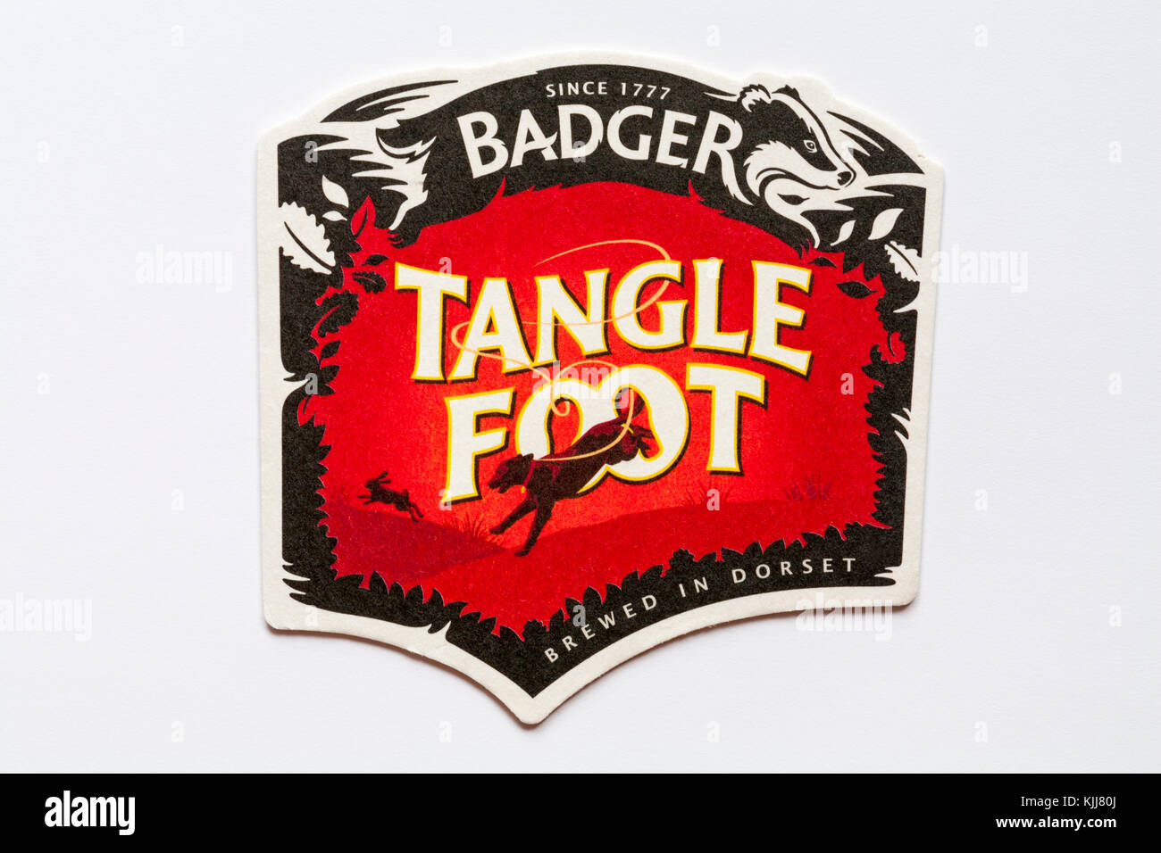 Tangle foot Badger brewed in Dorset coaster isolated on white ...