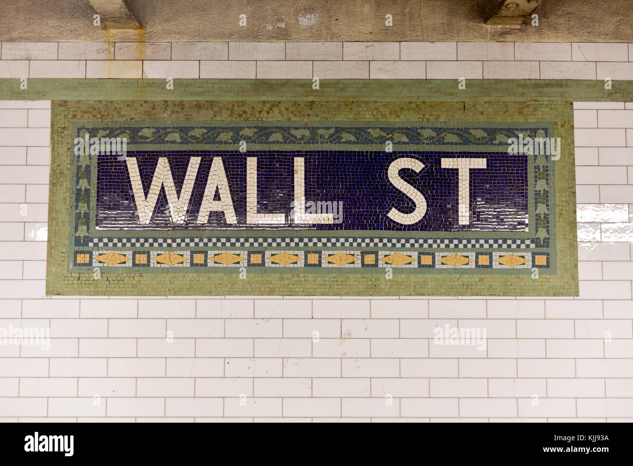 Wall street subway sign tile pattern in New York City Manhattan station ...
