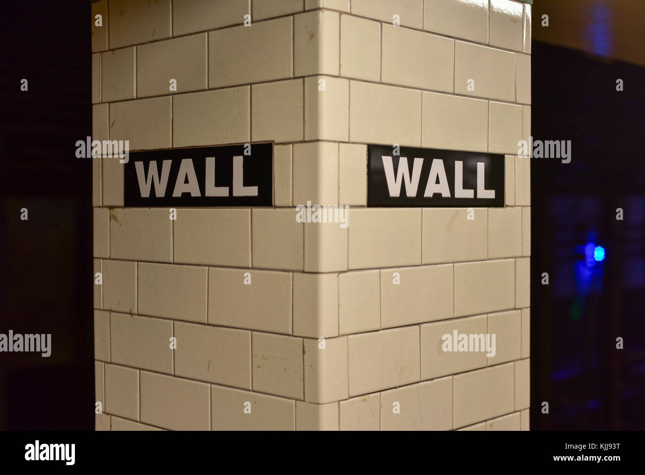 Wall street subway sign tile pattern in New York City Manhattan station ...