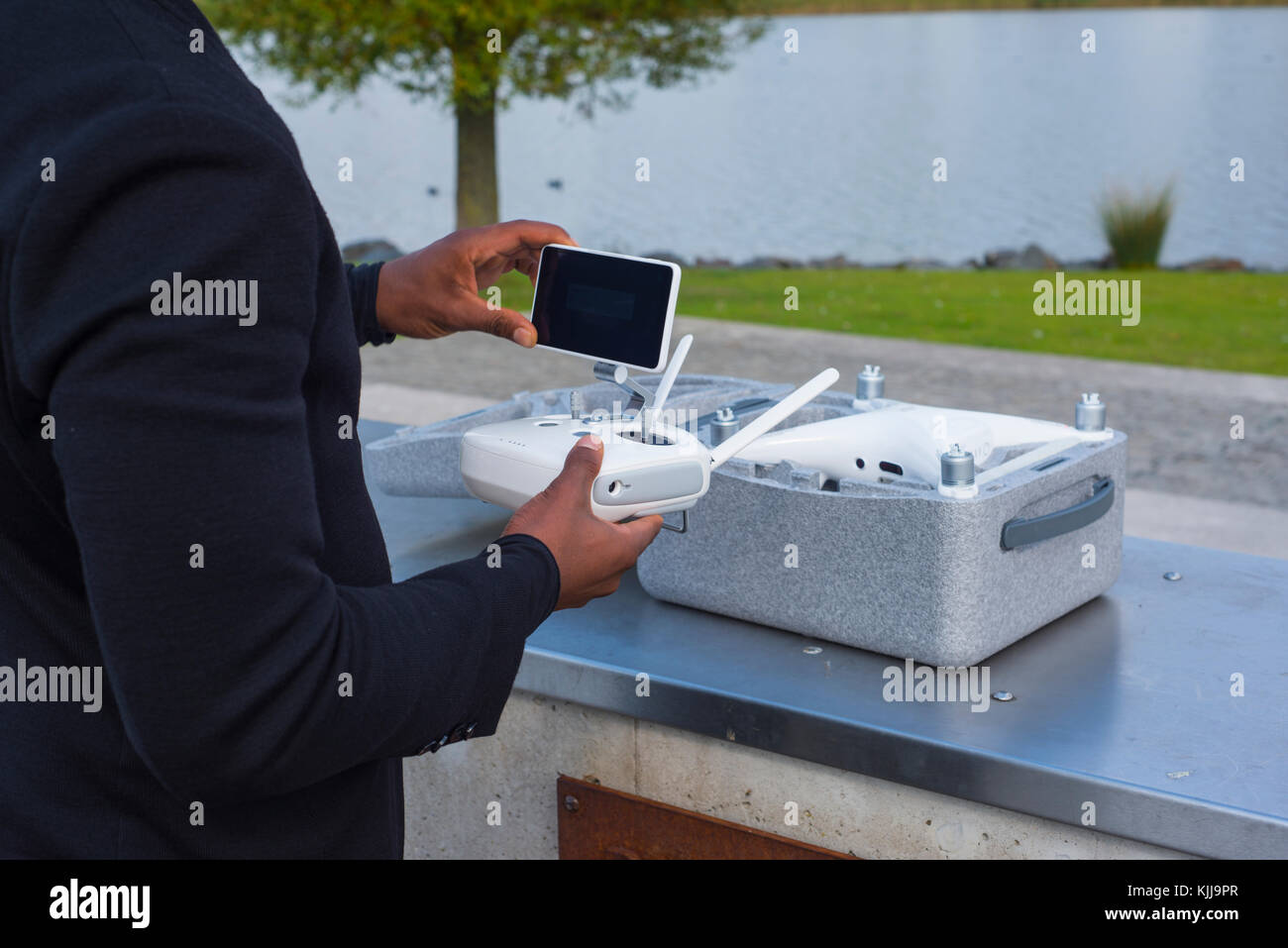 Drone equipment near a lake and the drone box delivered package Stock ...