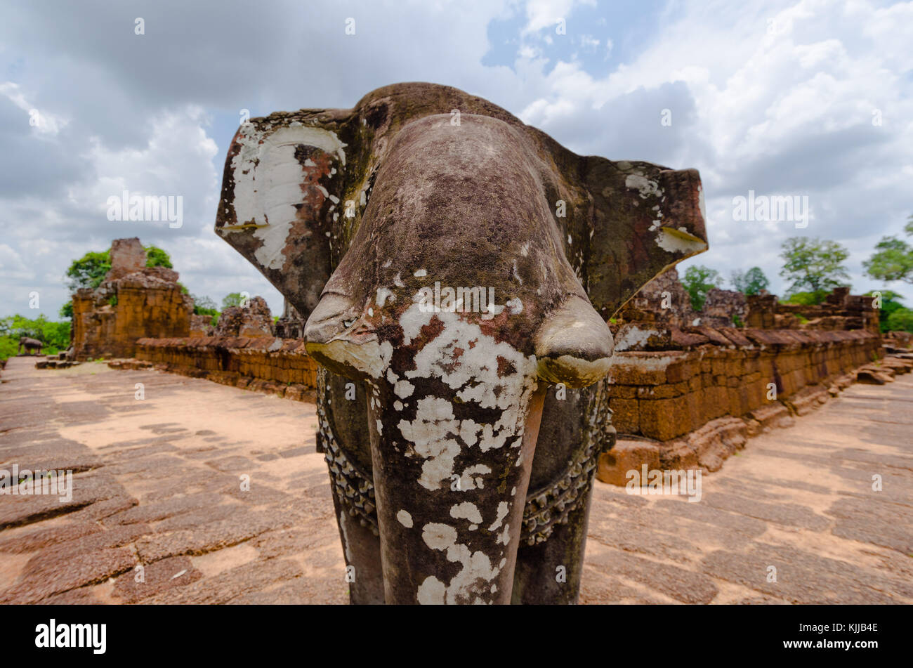 An stone elephant guards the corner of East Mebon ancient temple in ...