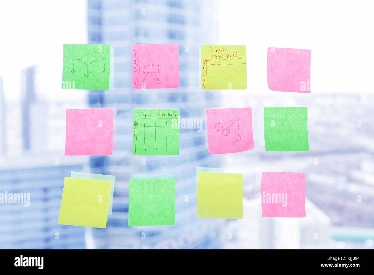Colorful sticky notes on window in the office Stock Photo - Alamy