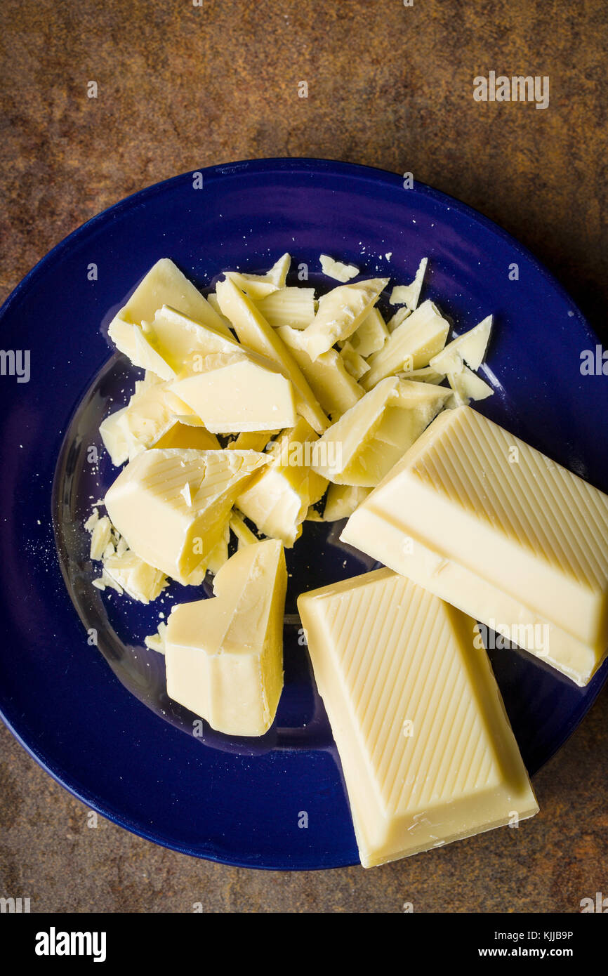 Chopped white chocolate. Top view Stock Photo - Alamy
