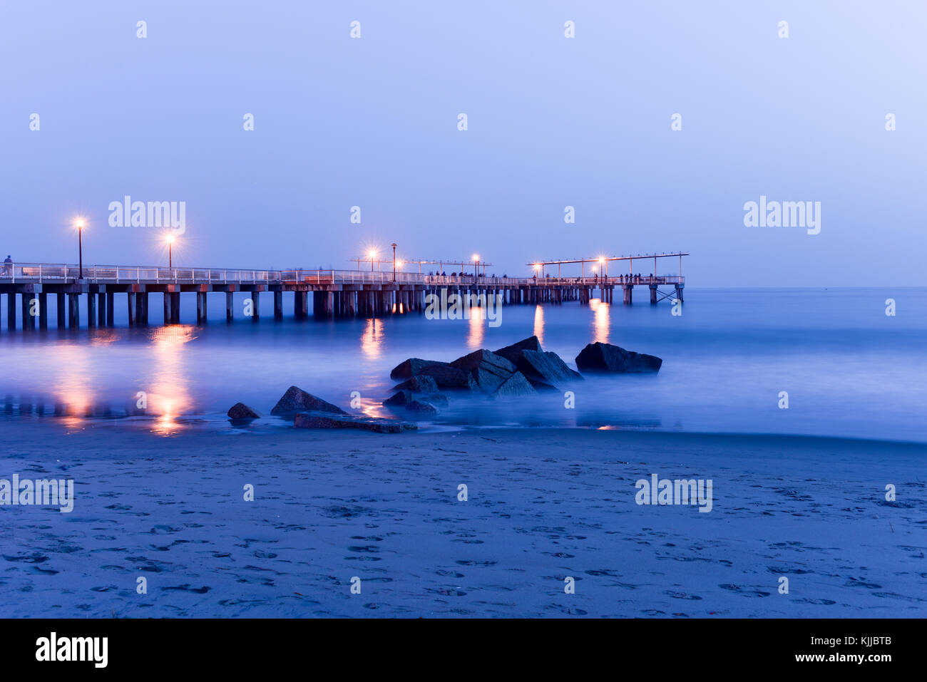 Pier and rocks on the beach. View from Coney Island Beach, Brooklyn ...