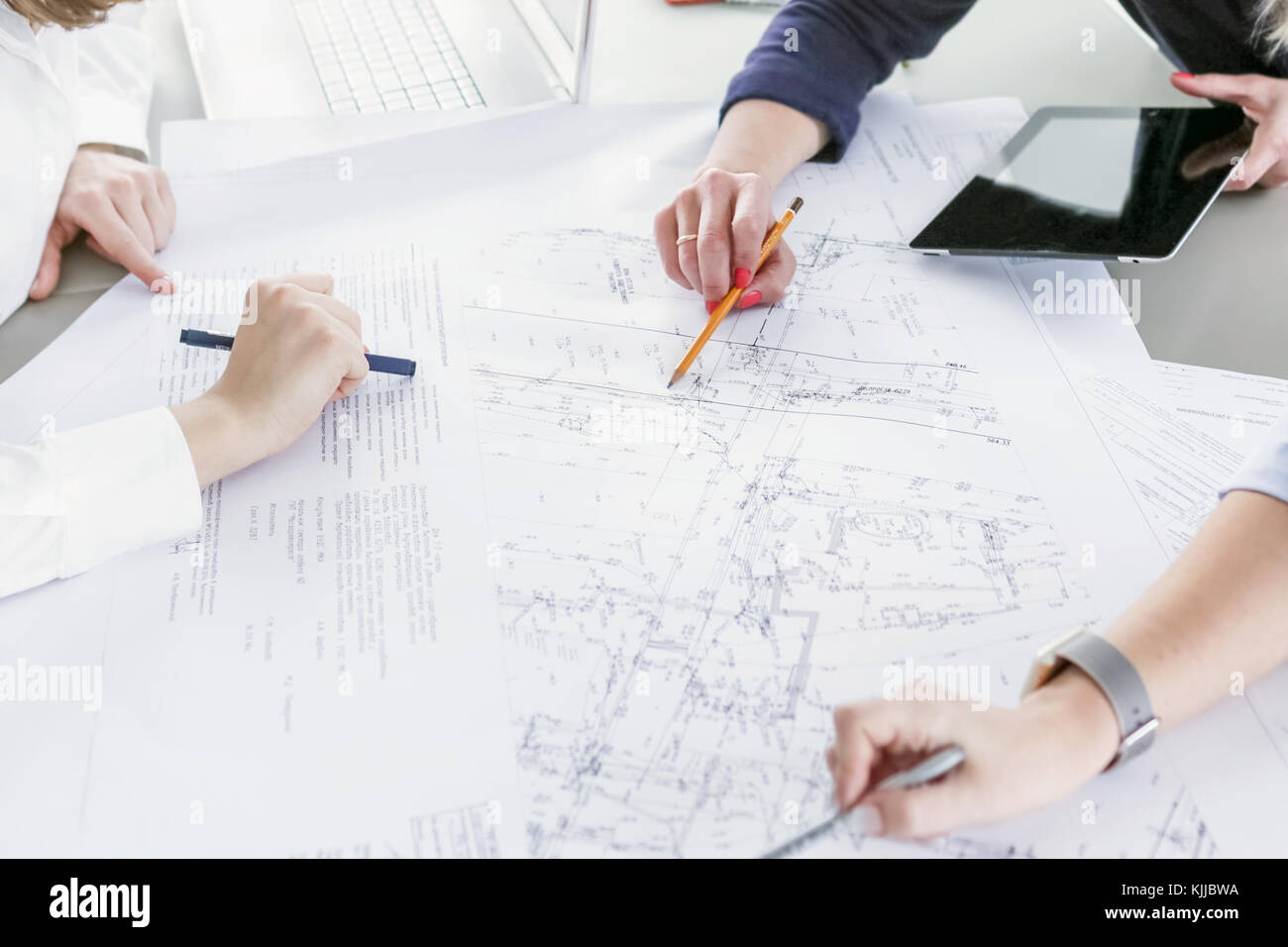 Business women working with business drawings Stock Photo - Alamy