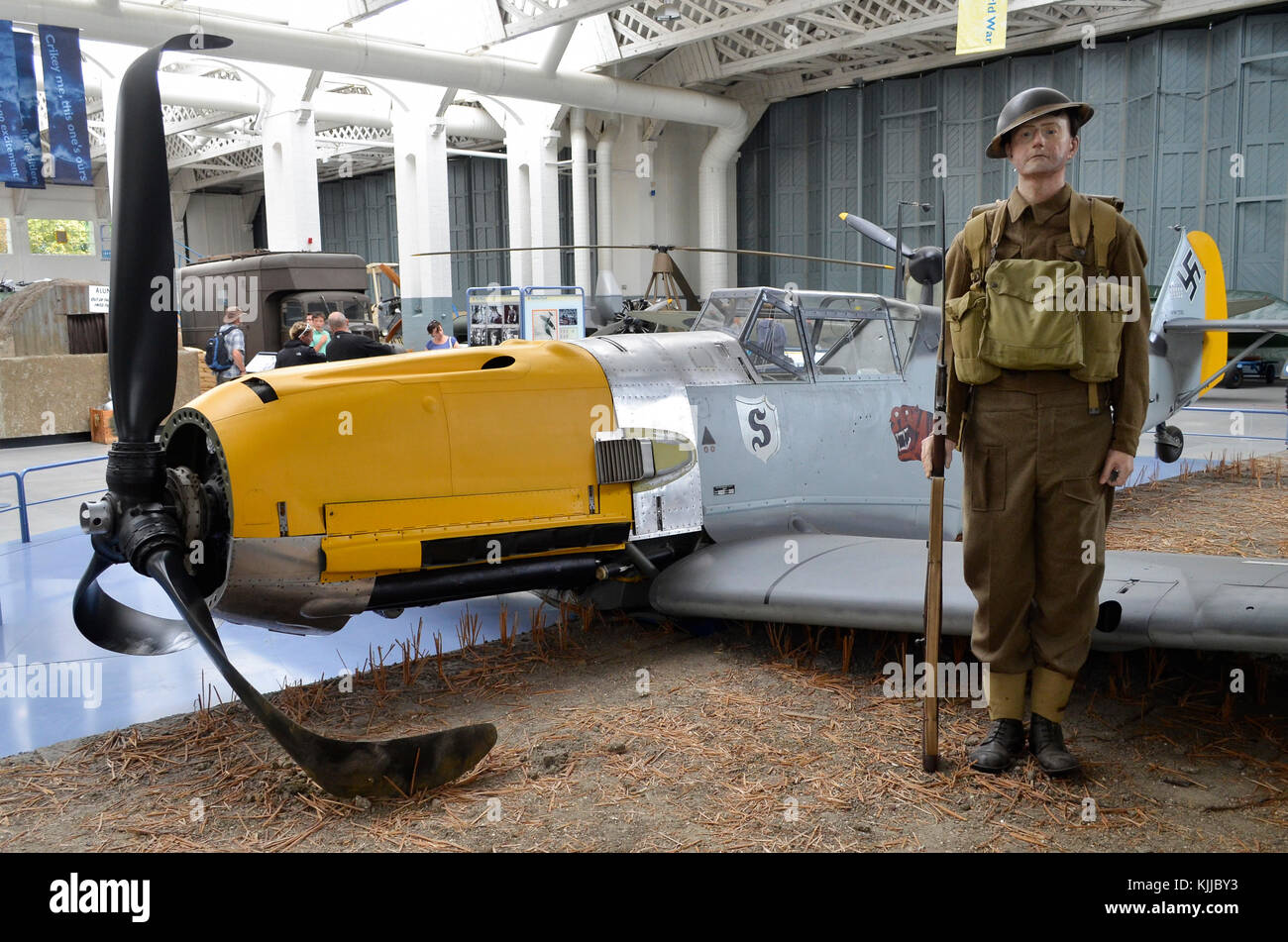 Messerschmitt Bf109E, Duxford IWM, UK, with British sentry recreating a ...