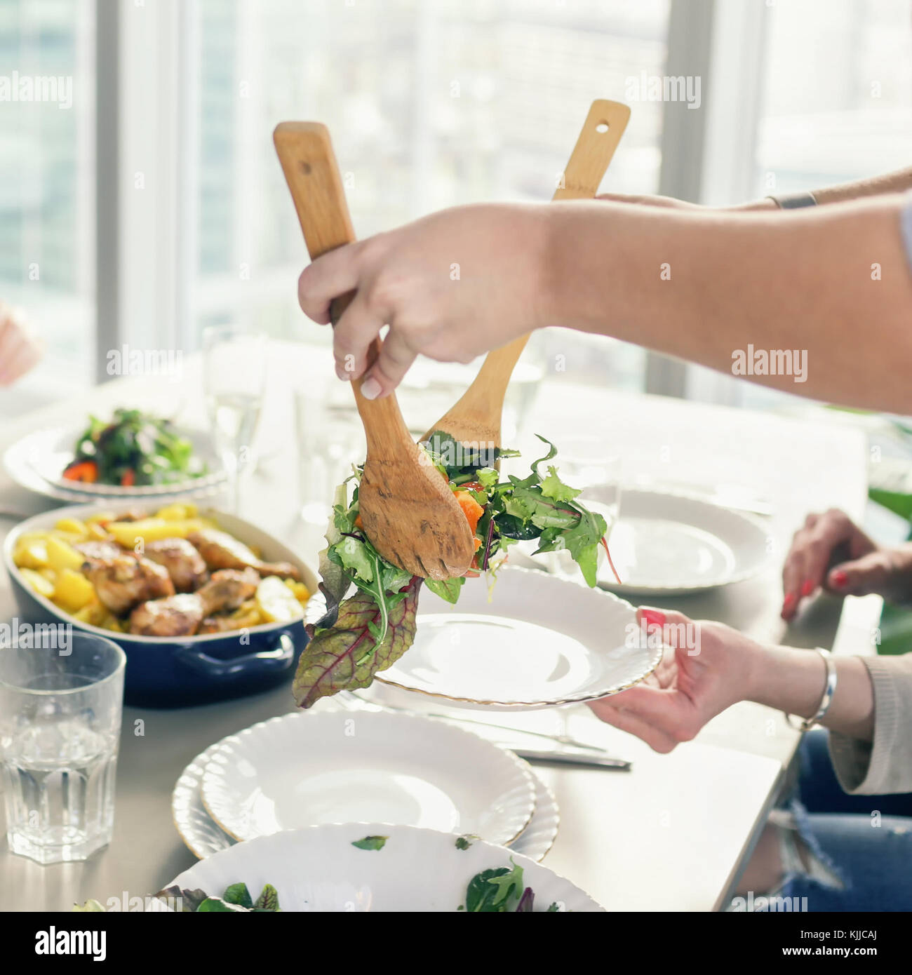 Women having dinner together Stock Photo - Alamy