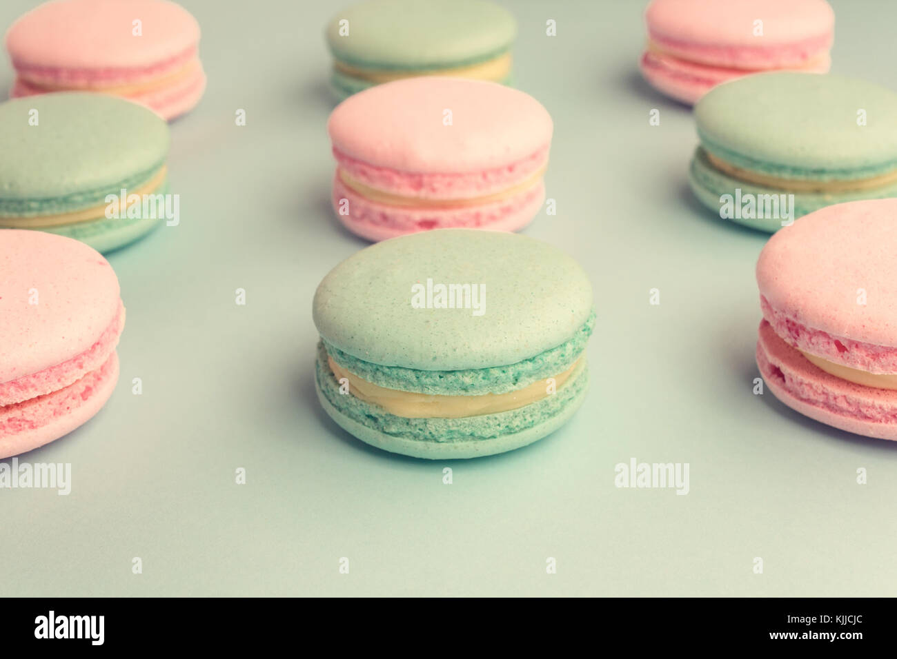 Assortment of sweet macaroons in rows Stock Photo - Alamy