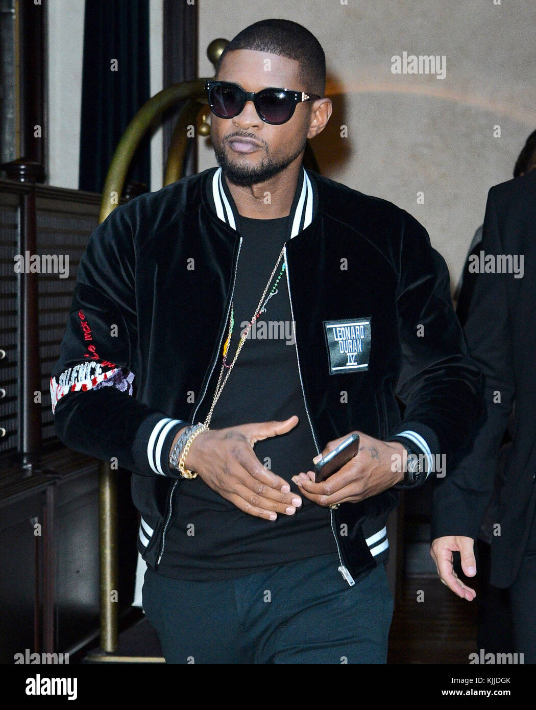 NEW YORK, NY - AUGUST 22: Singer and actor Usher leaves a downtown ...