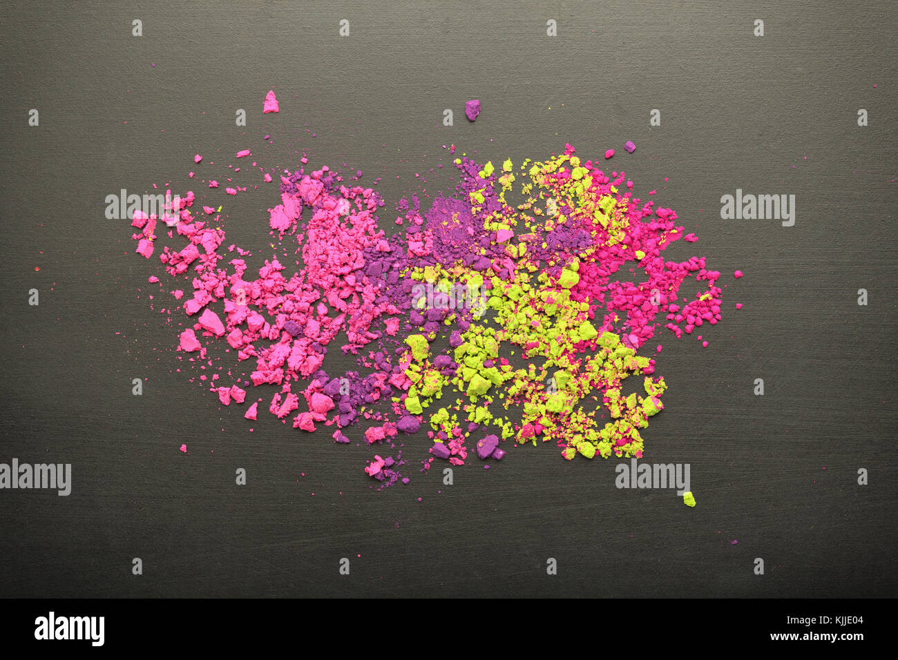 Top view of colorful make-up powder on black chalkboard texture Stock ...