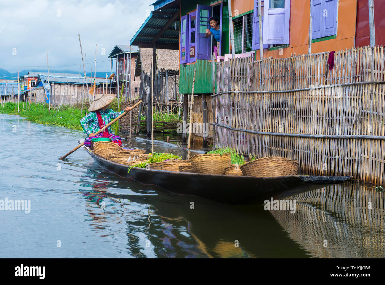 INLE LAKE , MYANMAR - SEP 07 : Intha woman on her boat in Inle lake ...