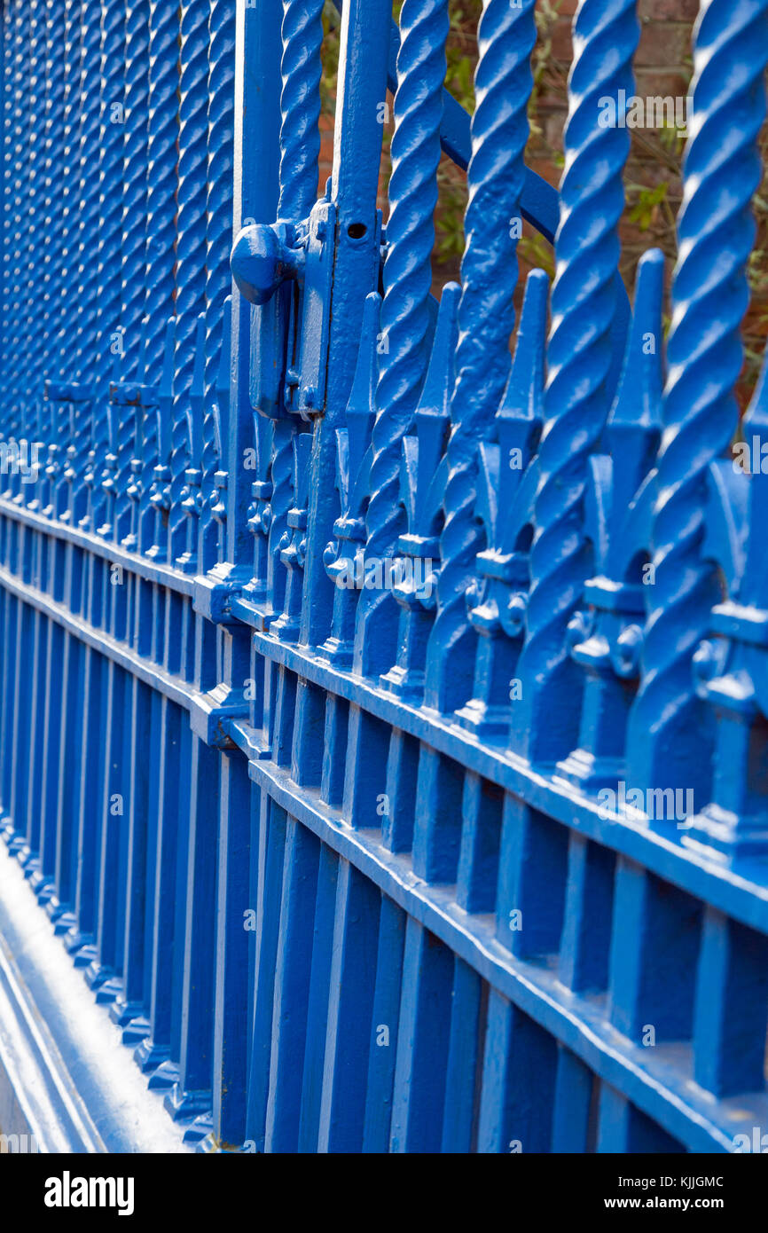 Wrought iron painted blue gates Stock Photo - Alamy