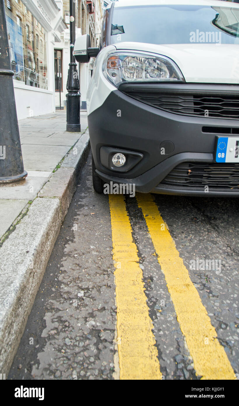 November 2017, London, England, A van parks on double yellow lines in ...