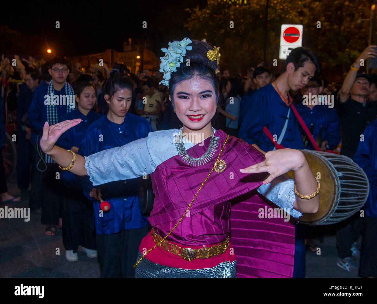 Participants in a parade during Yee Peng festival in Chiang Mai ...