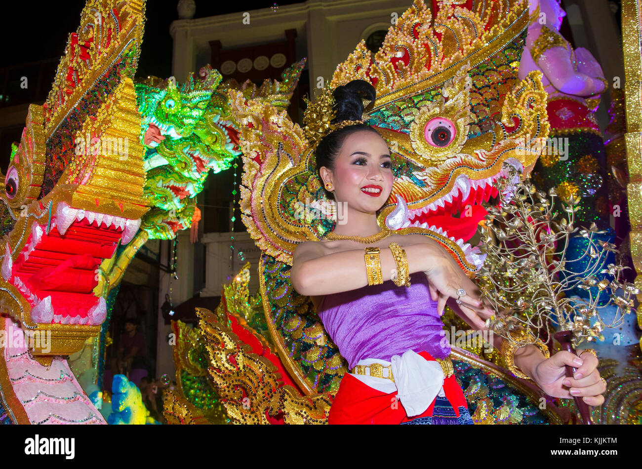 Participant in a parade during Yee Peng festival in Chiang Mai ...