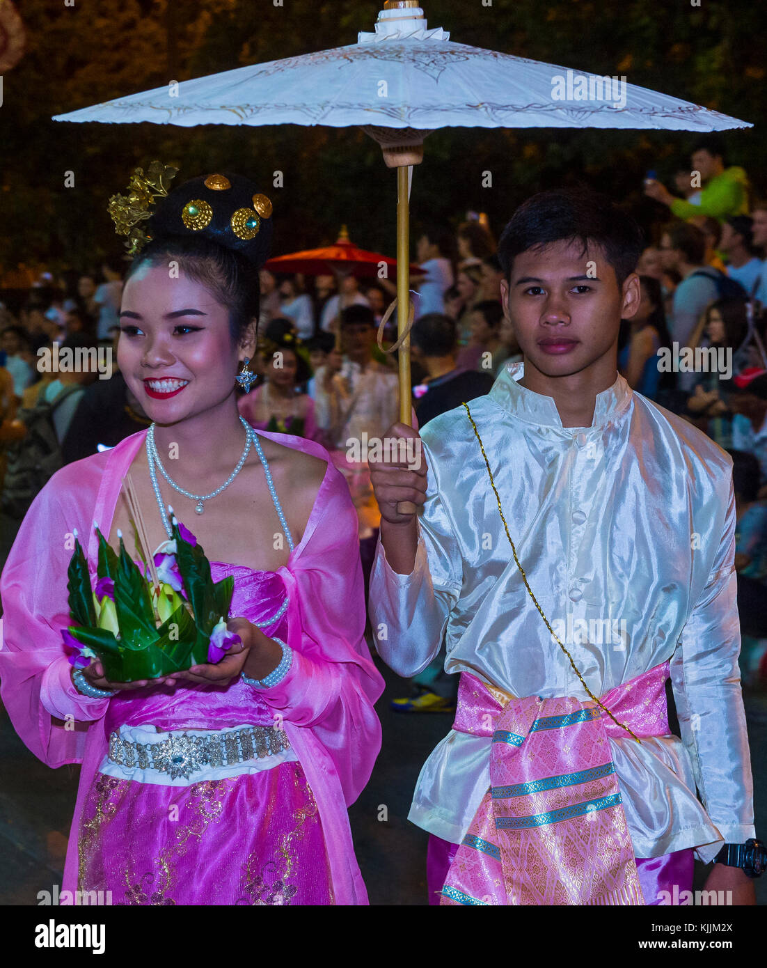 Participants in a parade during Yee Peng festival in Chiang Mai ...