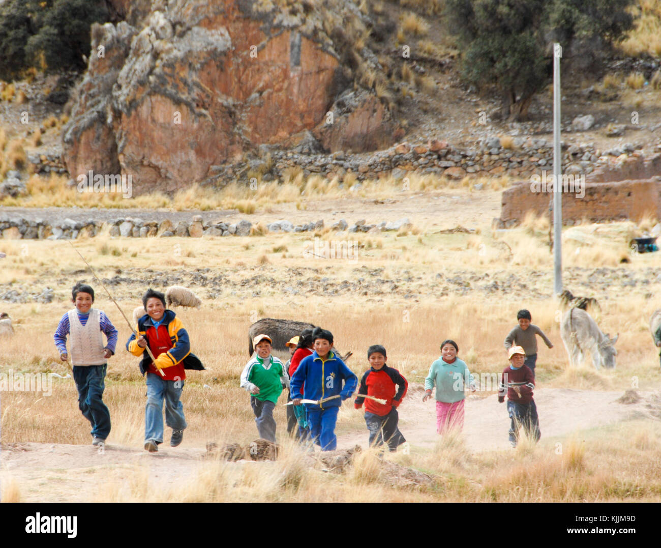 SACRED VALLEY OF THE INCAS, PERU - AUGUST 16, 2006: Children running ...