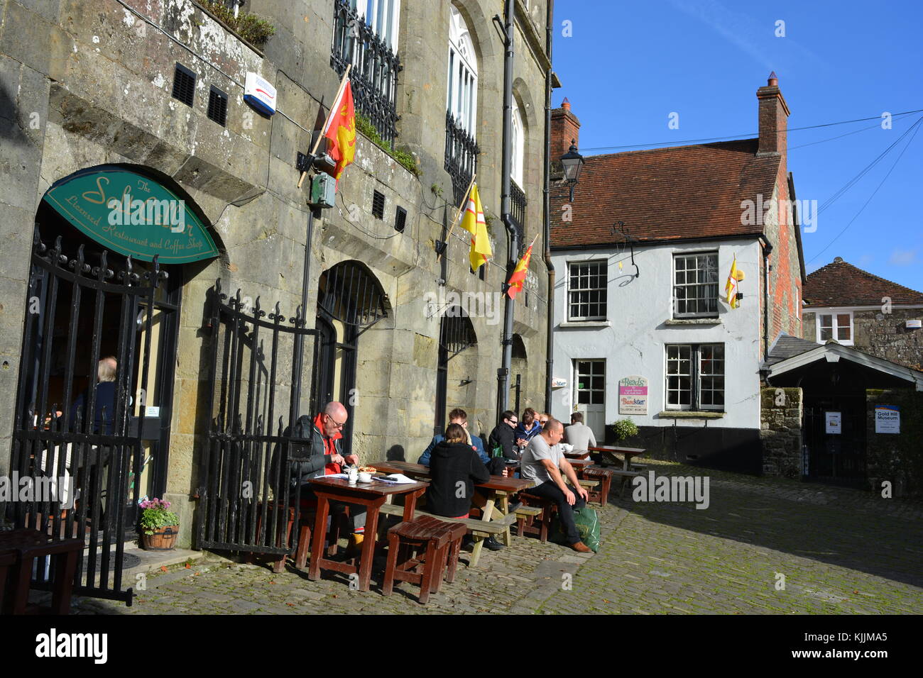 The Salt Cellar restaurant and cafe exterior with people sitting at ...