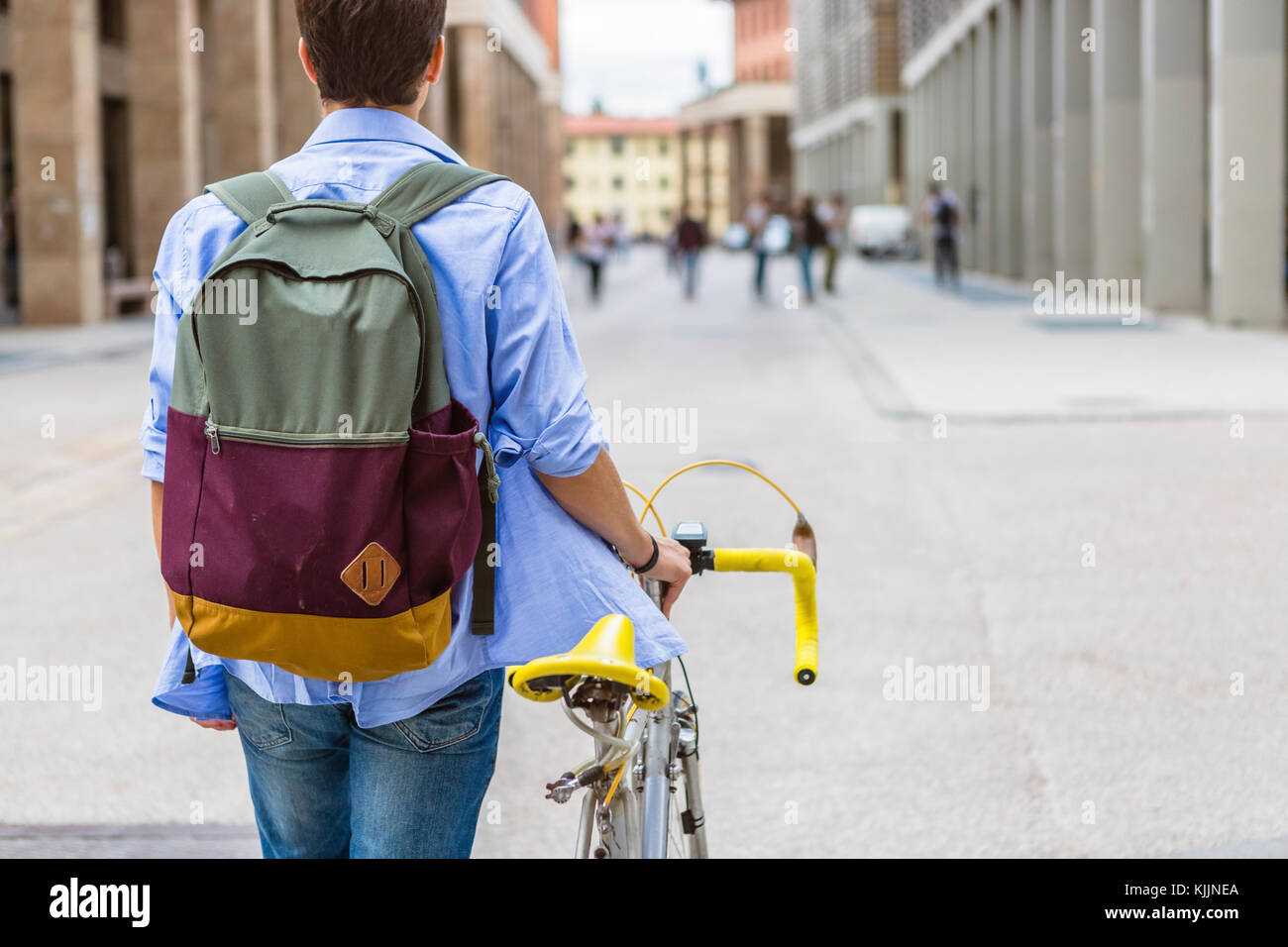 Back view man bike hi-res stock photography and images - Alamy