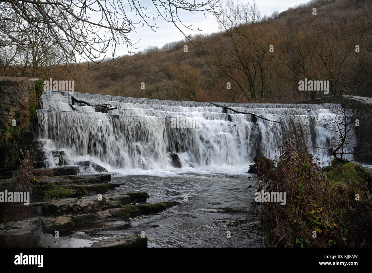 Weir on the River Wye in Monsal dale Derbyshire UK Stock Photo - Alamy