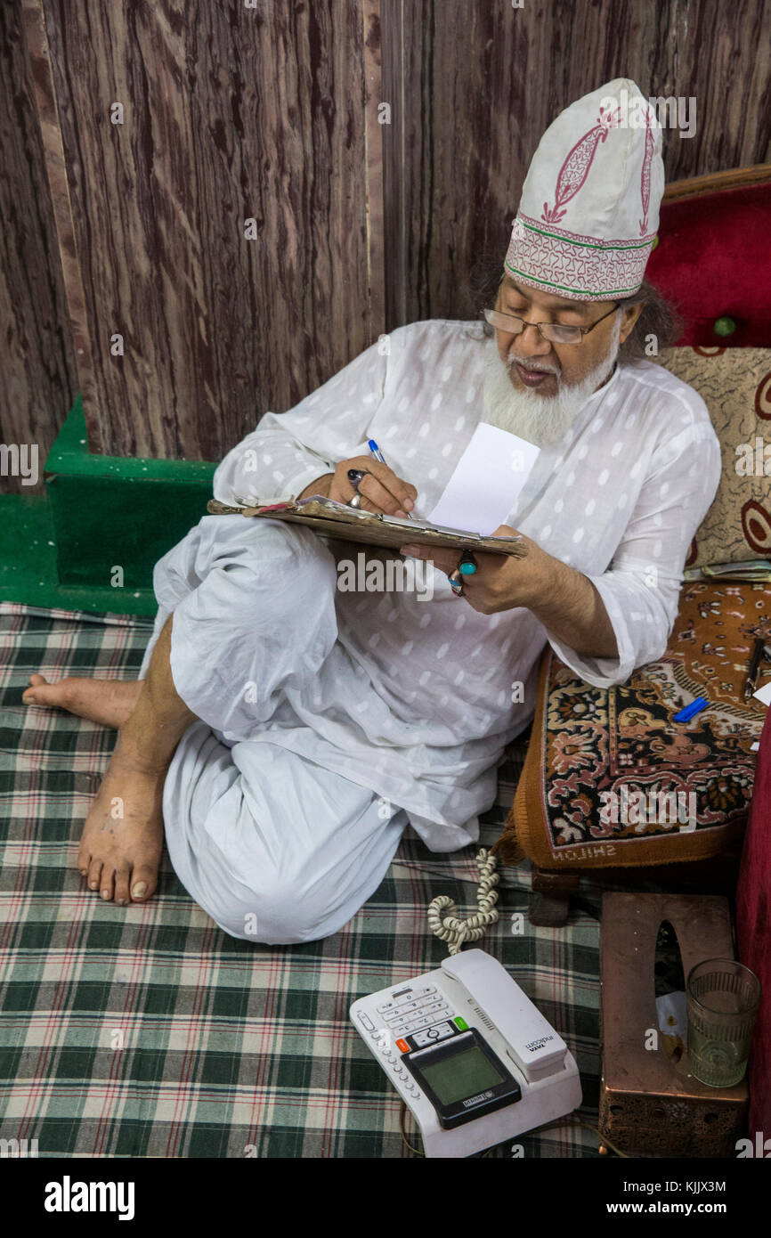 Pir in his office in Nizamuddin dergah, Delhi, India Stock Photo - Alamy