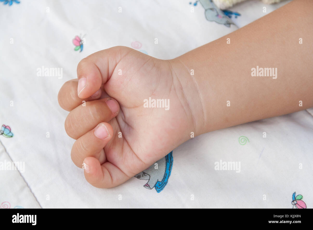 child sleep and Hands of handful empty. on bed Stock Photo - Alamy