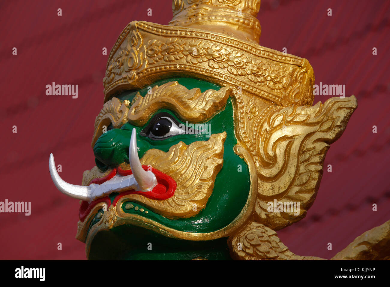 Close-up of "Yak" figure guarding the bot entrance of Wat Khao Takiab ...