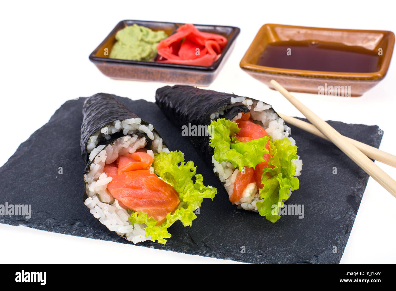 Tasty fresh sushi cone on black stone. Studio Photo Stock Photo - Alamy