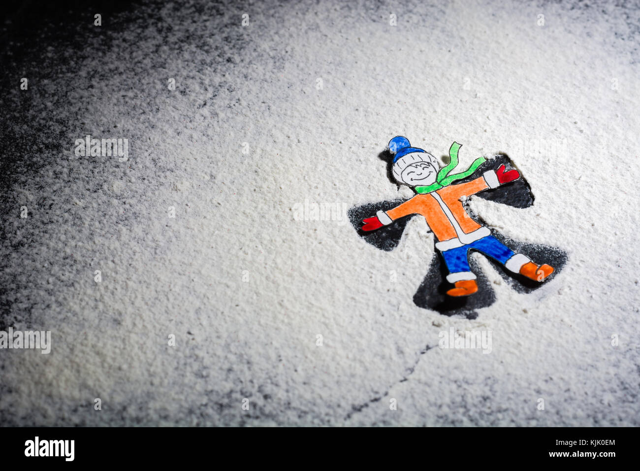 Paper figure of the child as a snow angel. Hand made paper figurine. A ...