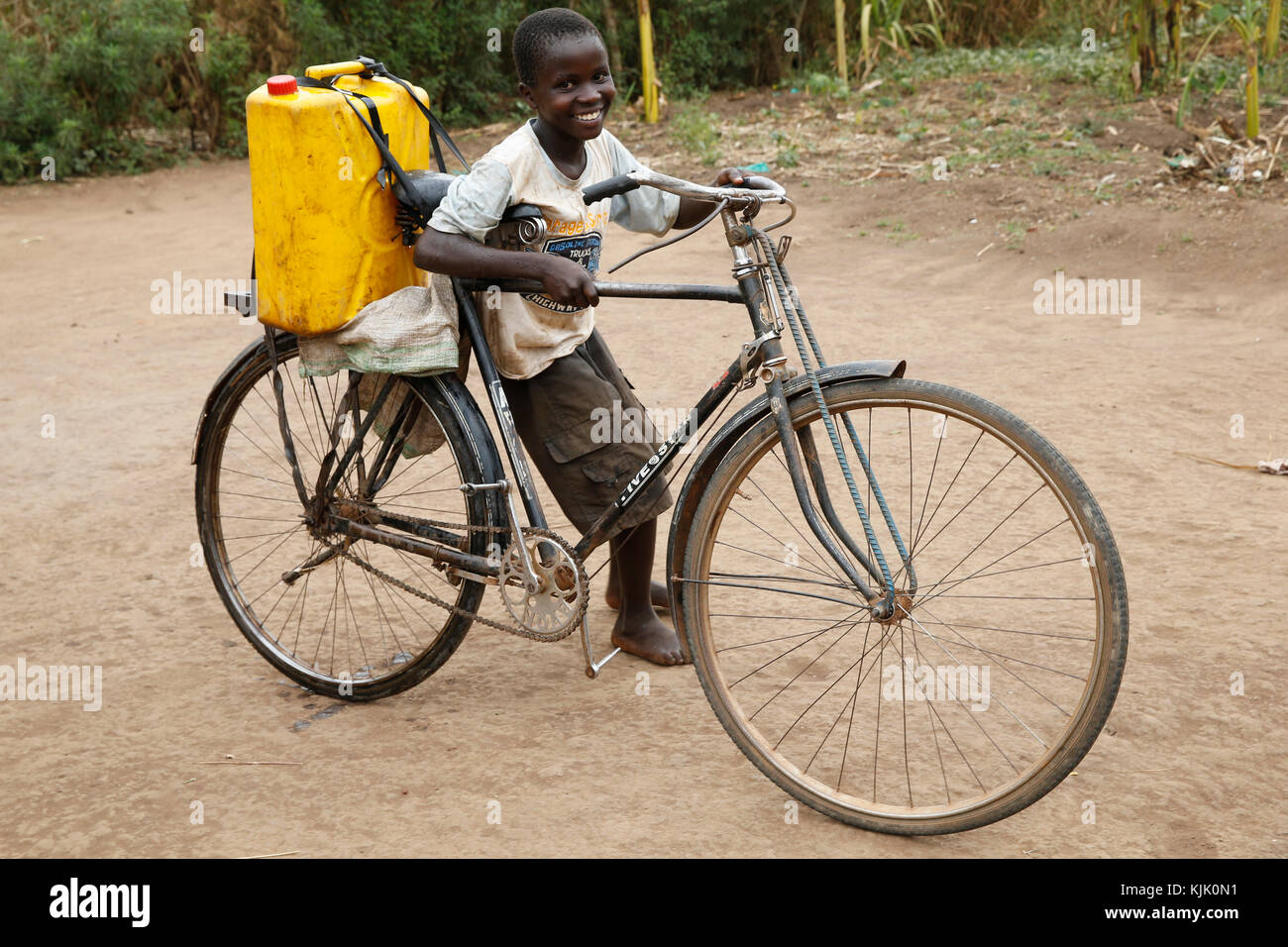 Child Fetching Water High Resolution Stock Photography and Images - Alamy