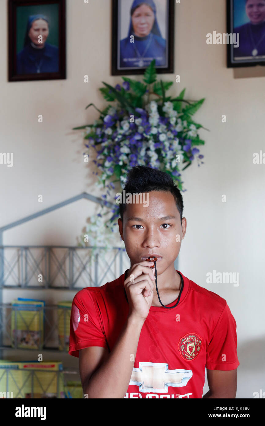 Orphan boy at orphanage hi-res stock photography and images - Alamy