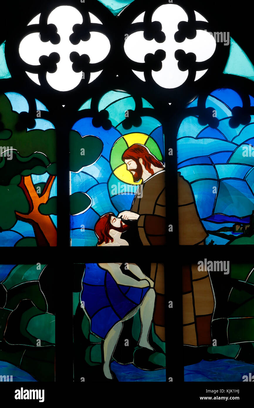 Stained glass window jesus baptism hi-res stock photography and images ...