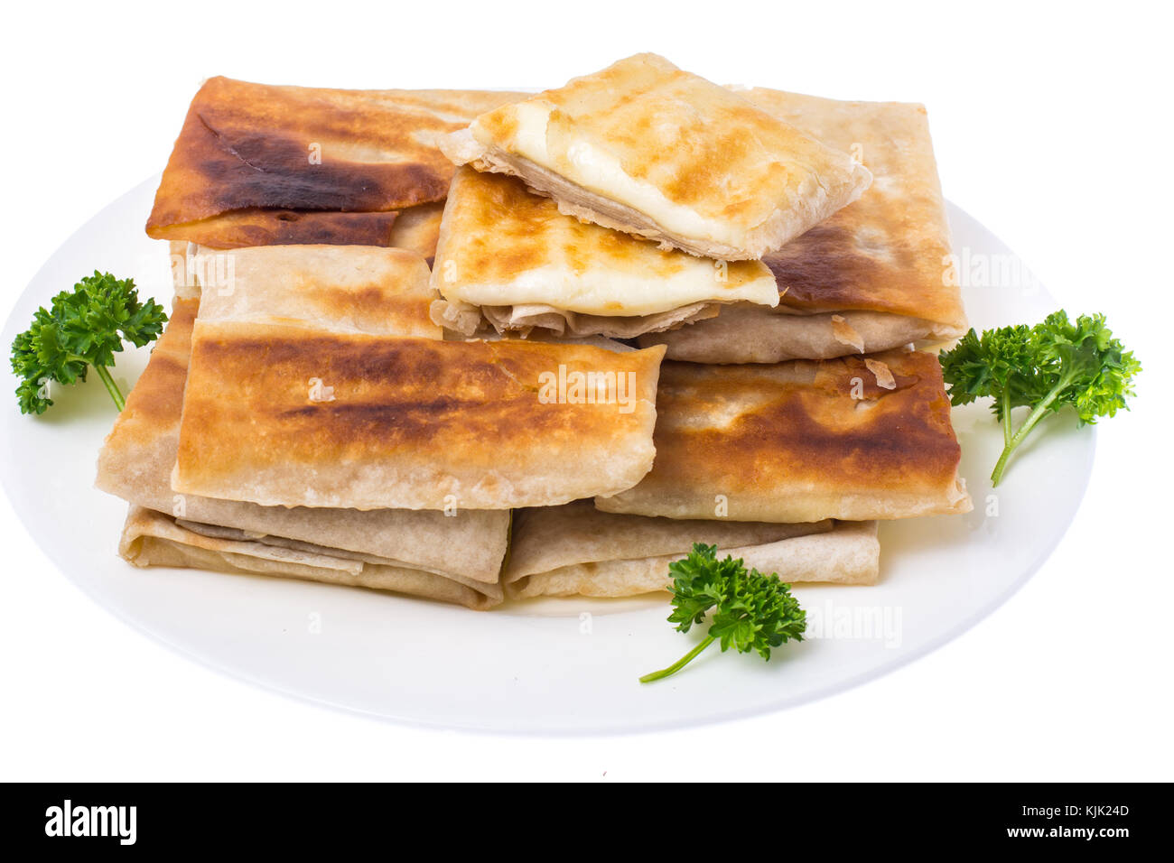 Grilled pita bread with cheese filling, close up,delicious and hearty ...