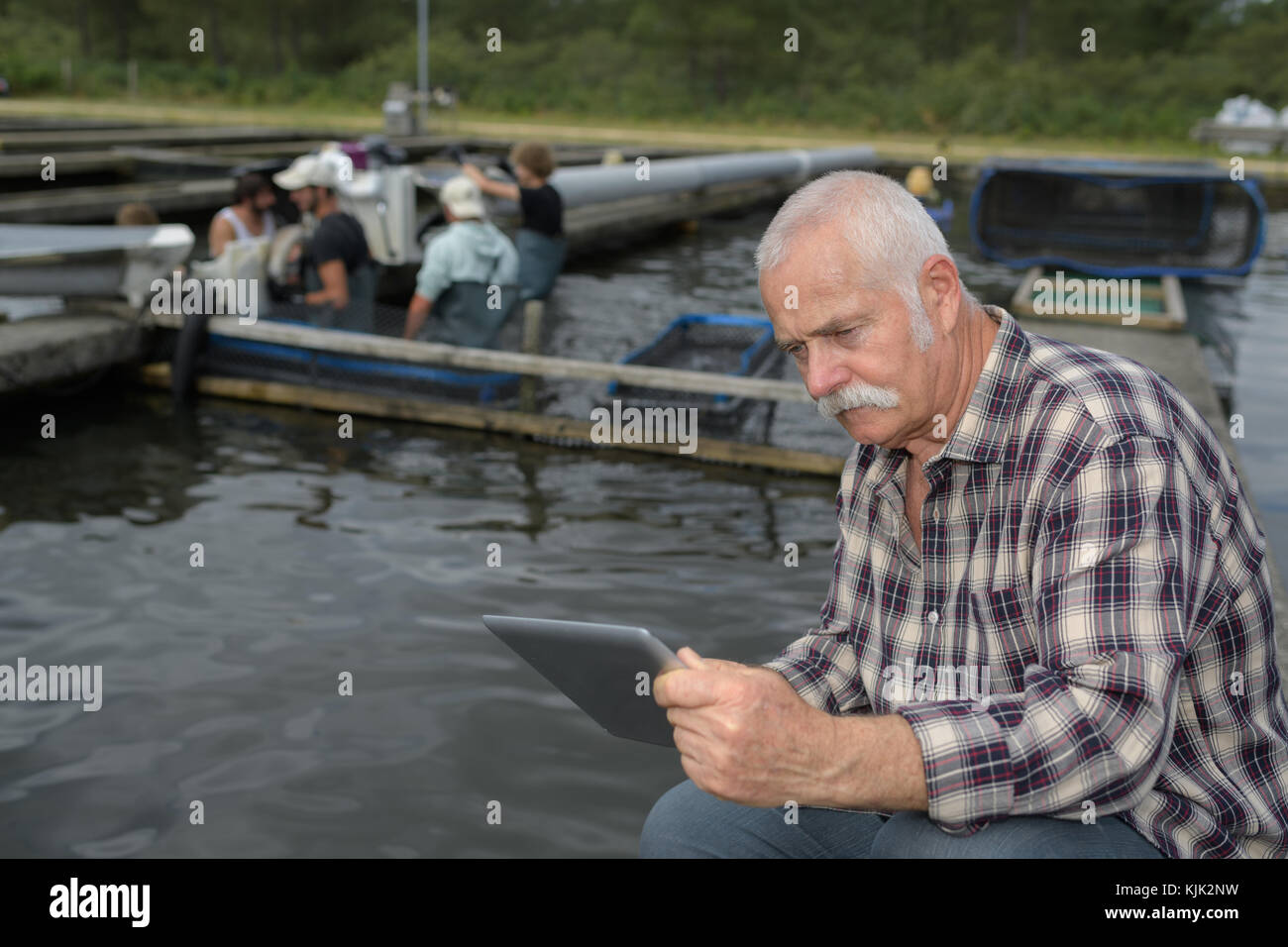 Farmer holding fish hi-res stock photography and images - Alamy
