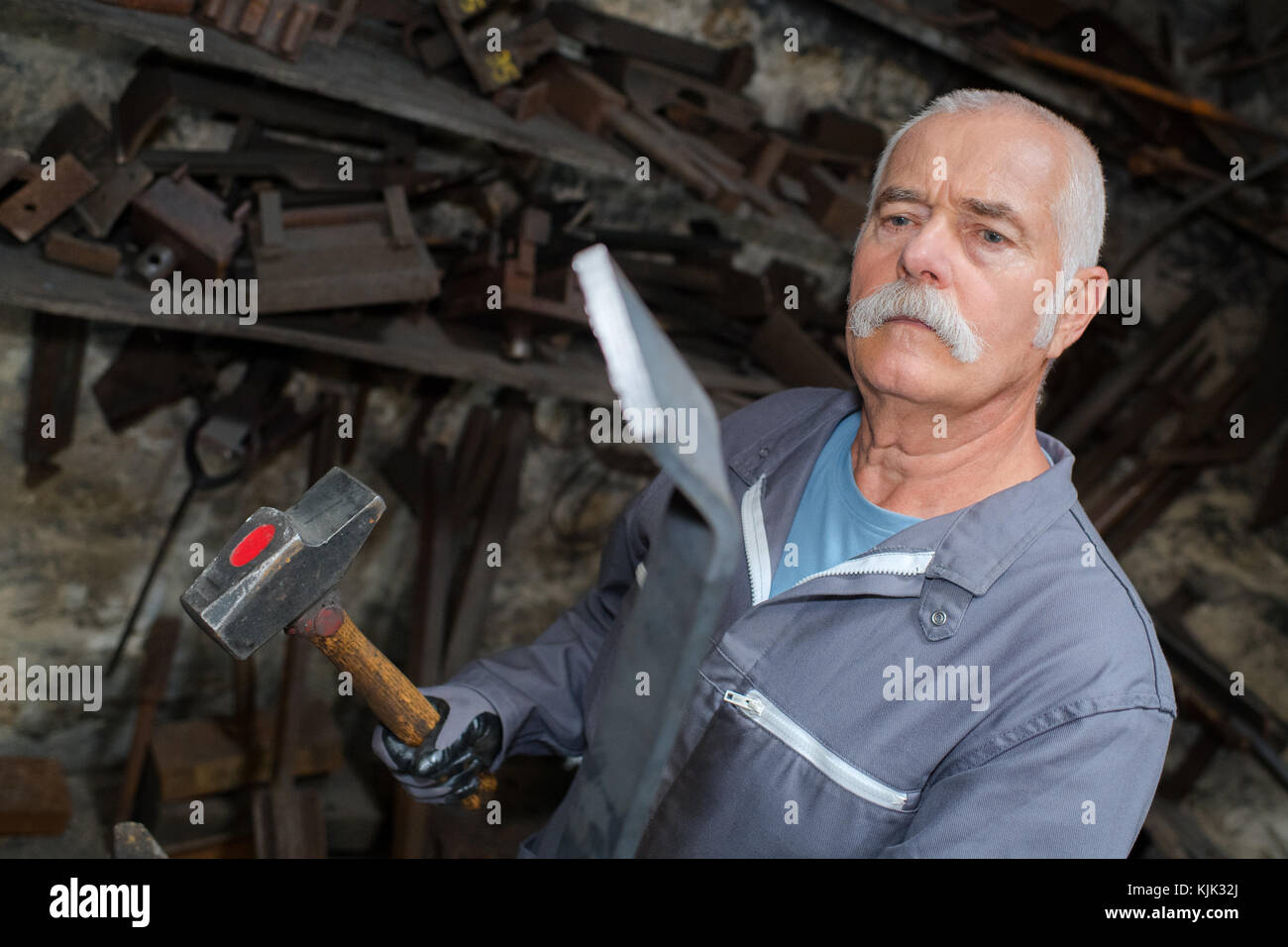 worker in metallurgy workshop Stock Photo - Alamy