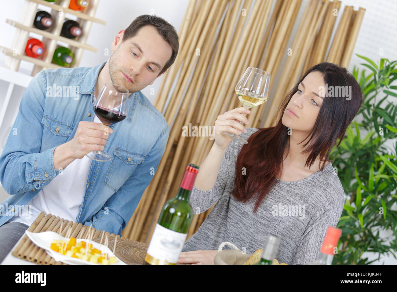 young oenophile couple with wine Stock Photo - Alamy