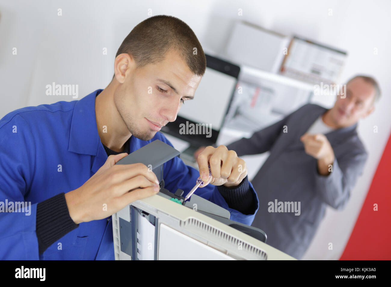 Printer with apprentice hi-res stock photography and images - Alamy