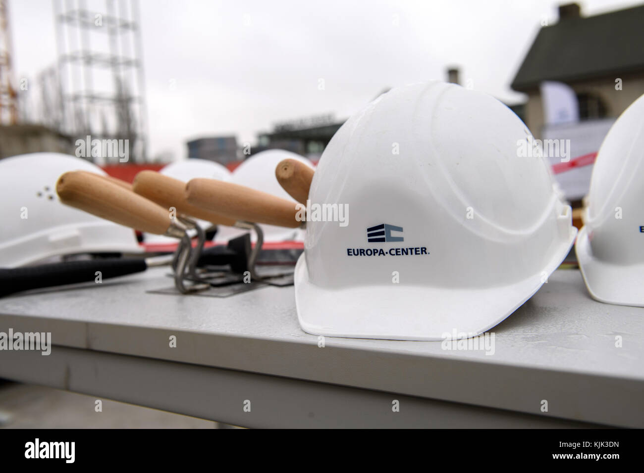 Helmets and masonry tools are symbolically laid ready for the ...