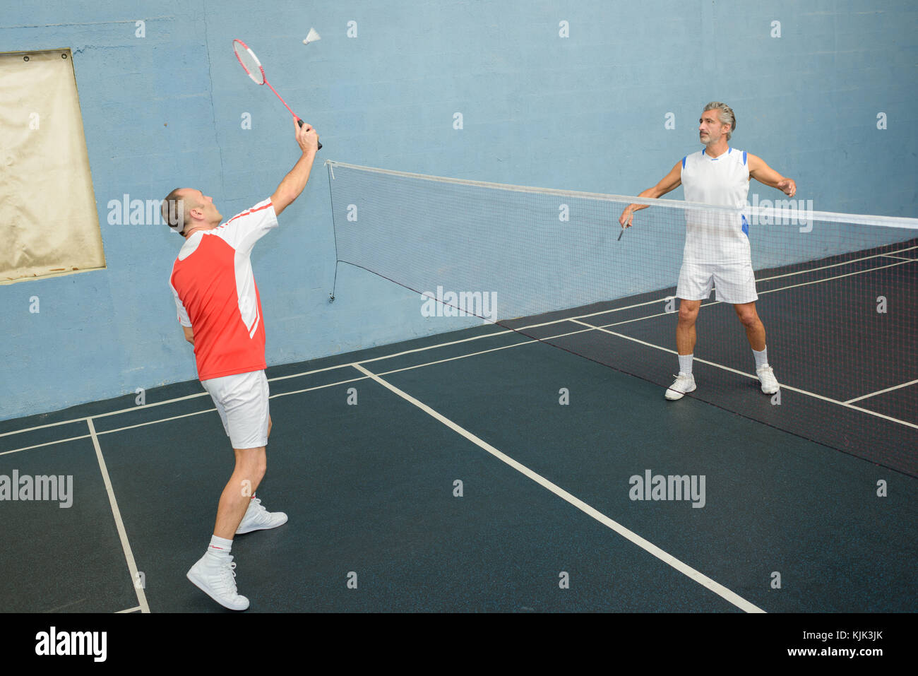 men playing badminton Stock Photo - Alamy