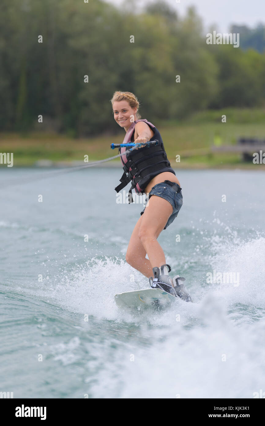 woman water skiing on a lake Stock Photo - Alamy