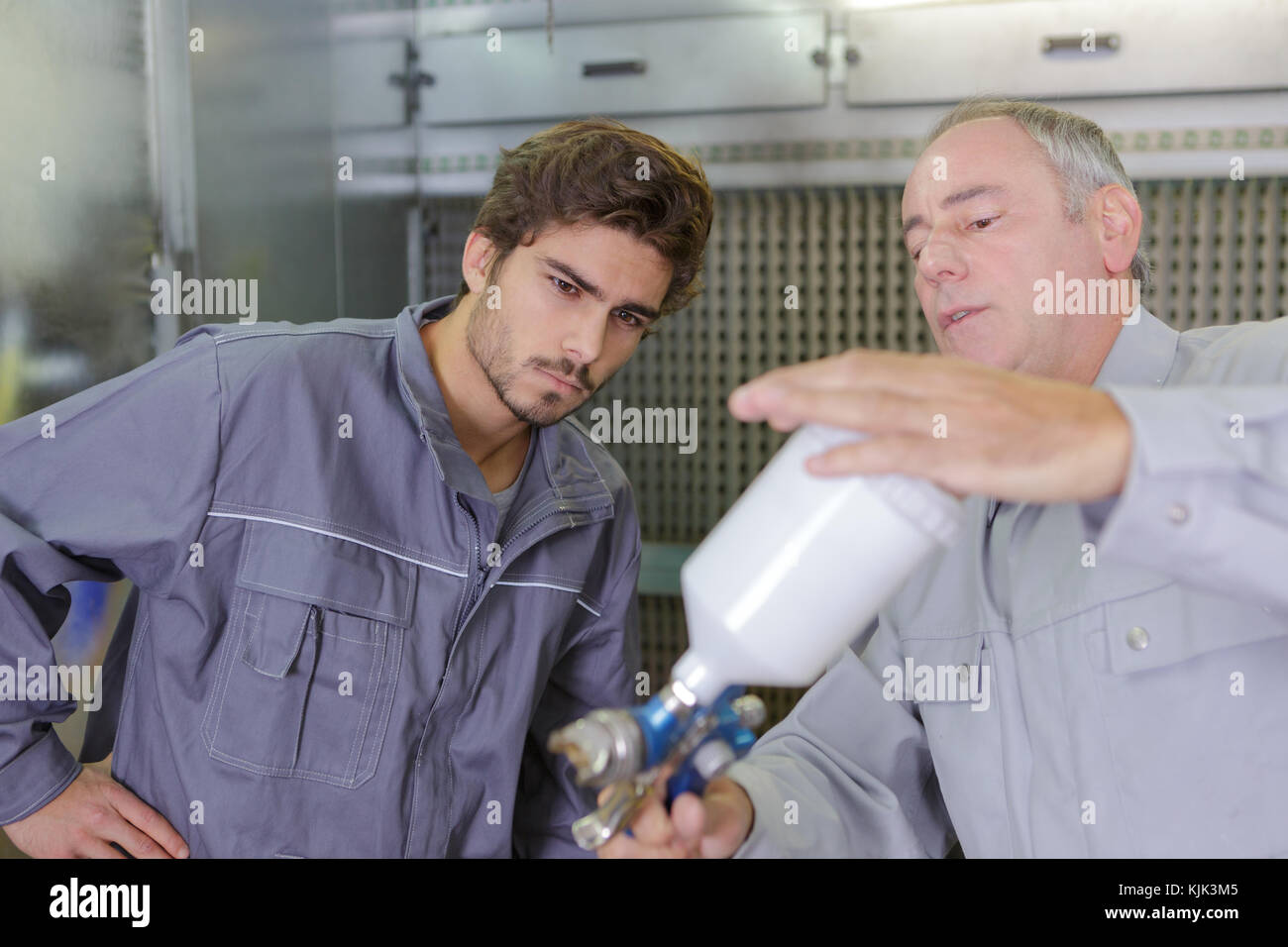 shaking the painting container Stock Photo - Alamy