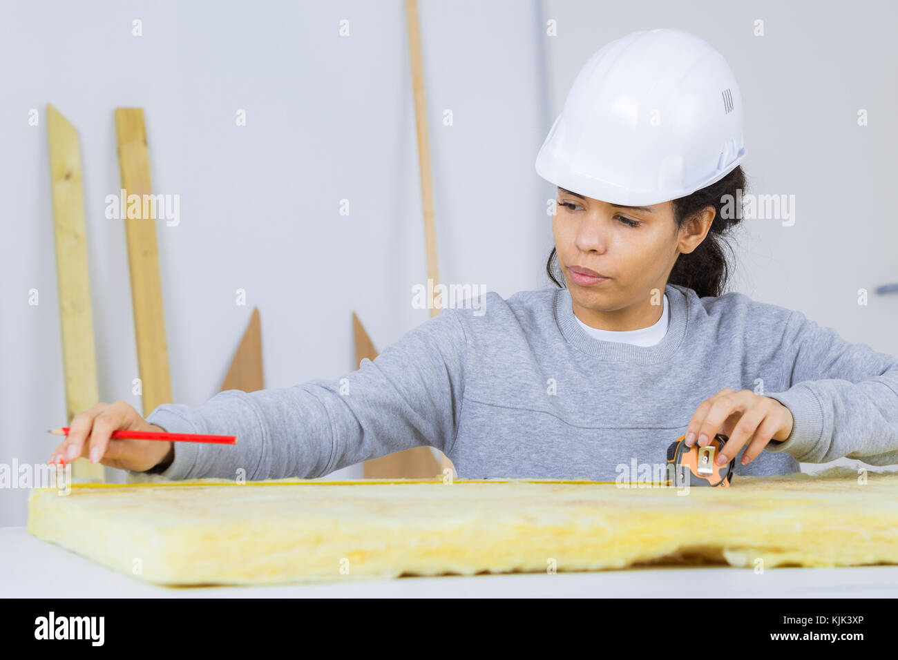 woman insulation installer Stock Photo - Alamy