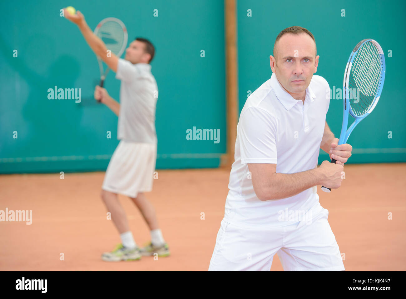 doubles tennis match Stock Photo - Alamy