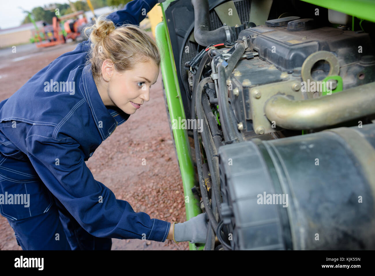 girl repairing engine Stock Photo - Alamy