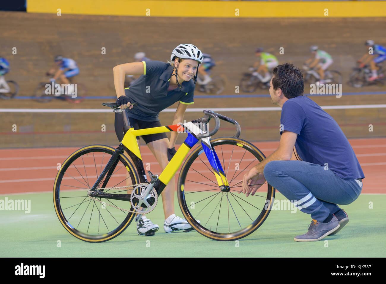 female cyclist training on a velodrome Stock Photo - Alamy
