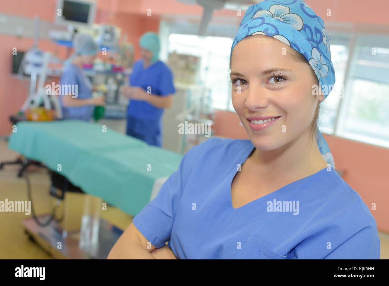 medical nurse posing and smiling Stock Photo - Alamy